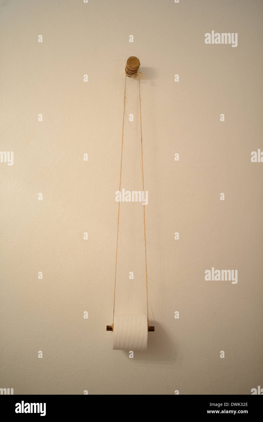 Toilet paper roll hanging from a rope hi-res stock photography and ...