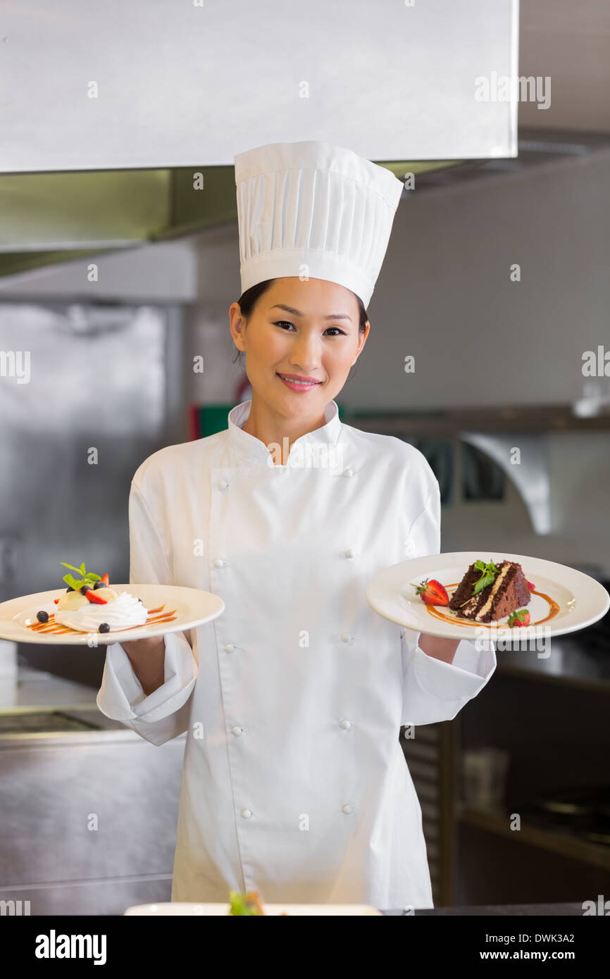 Asian female pastry chef holding hi-res stock photography and images ...