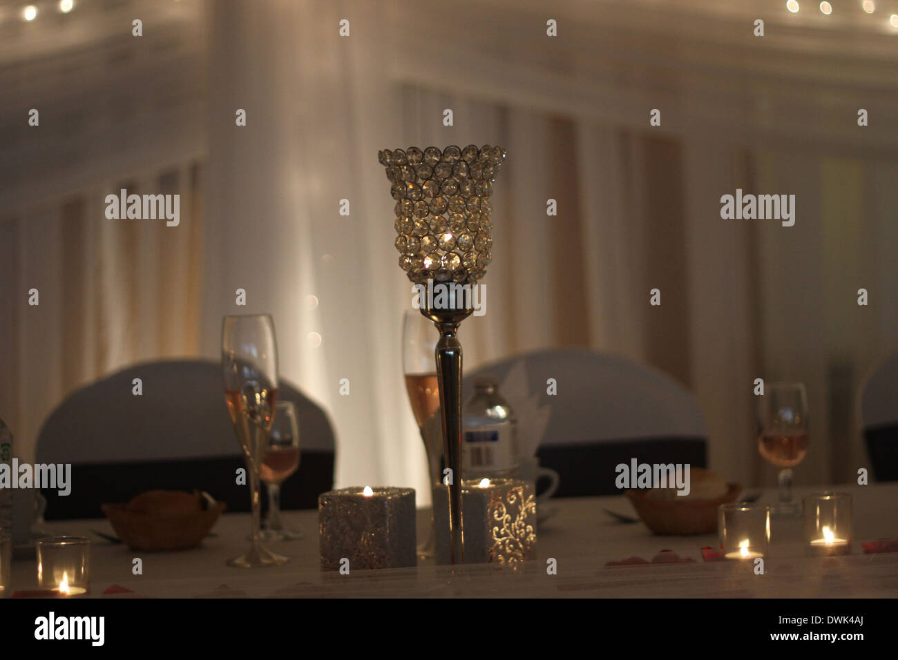 A wedding supper table covered with candles Stock Photo - Alamy