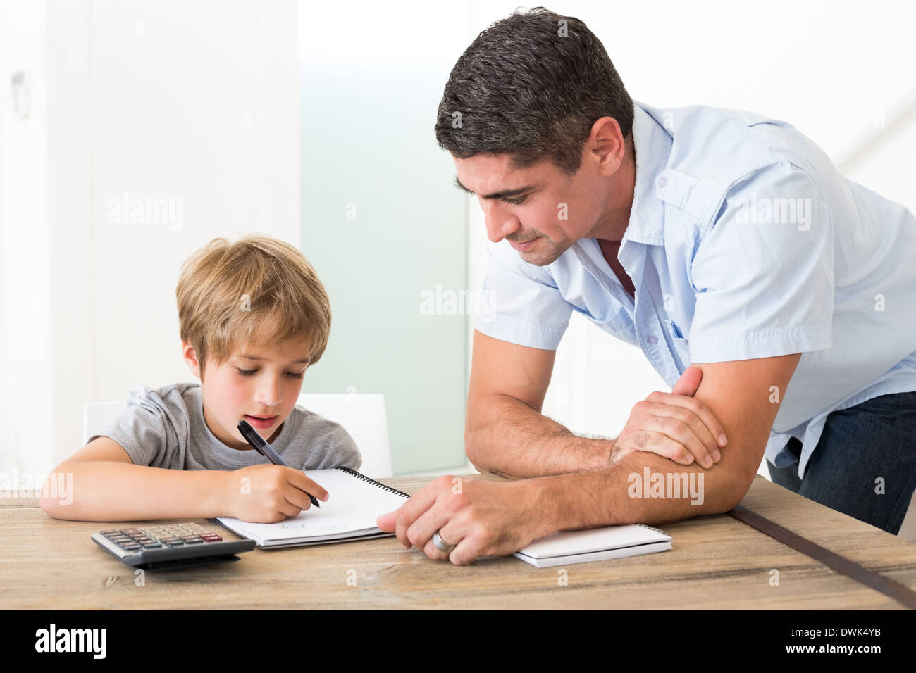 Father homework standing hi-res stock photography and images - Alamy