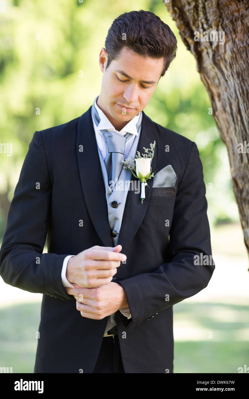 Man adjusting sleeve hi-res stock photography and images - Alamy