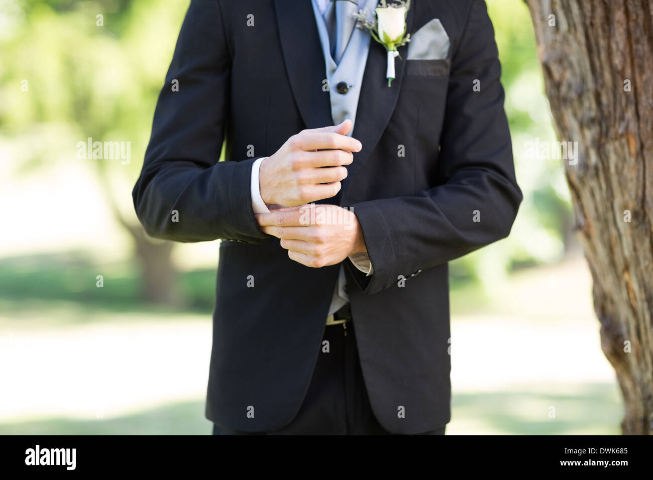 Man adjusting sleeve hi-res stock photography and images - Alamy