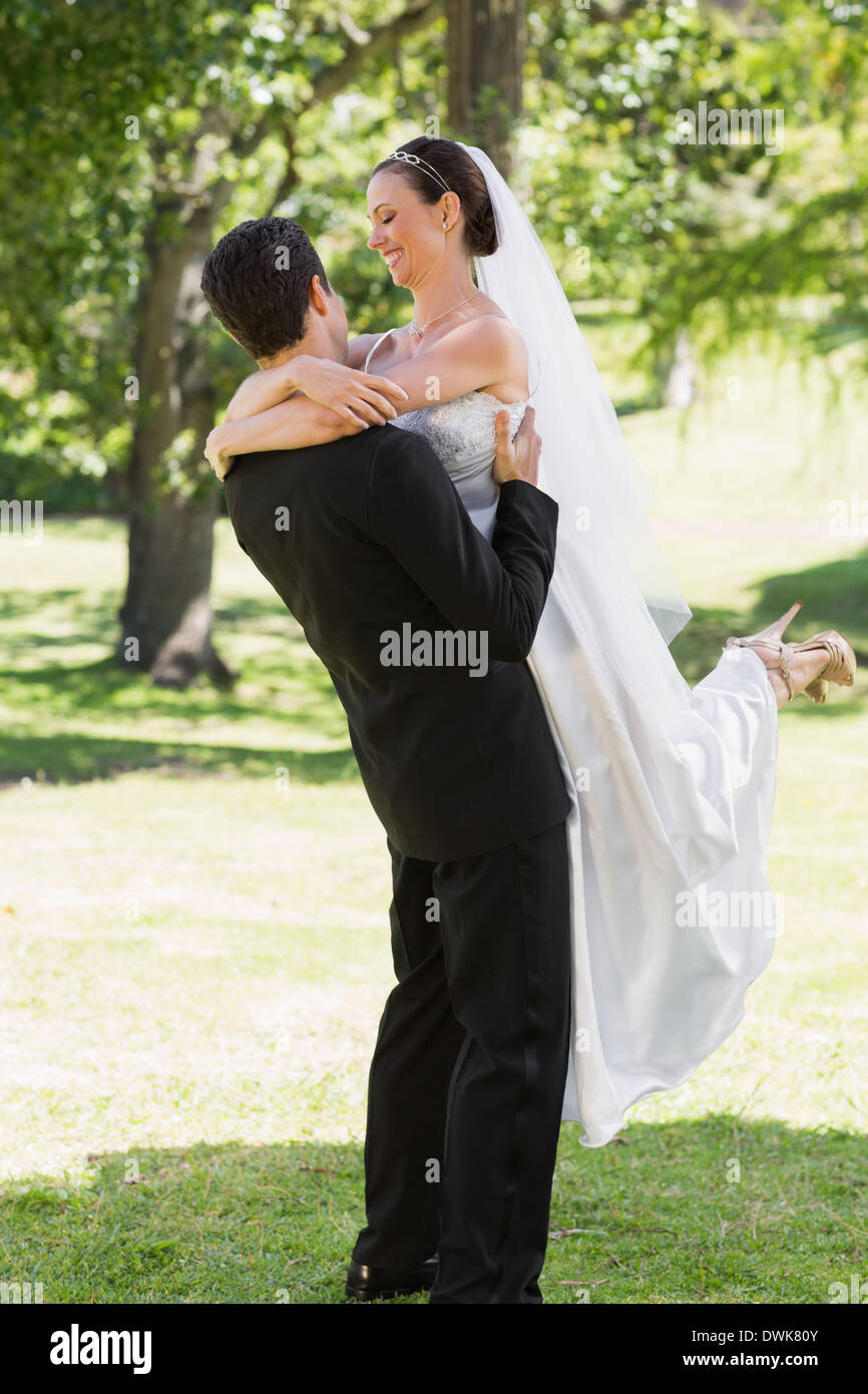 Lifting bride hi-res stock photography and images - Alamy