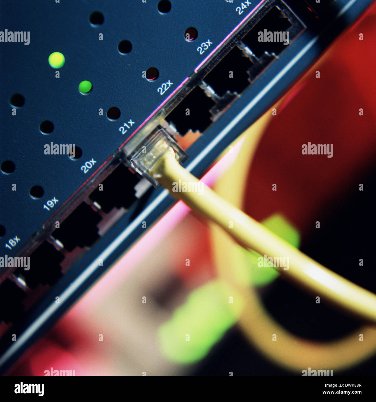 Blue router with yellow cable Stock Photo - Alamy