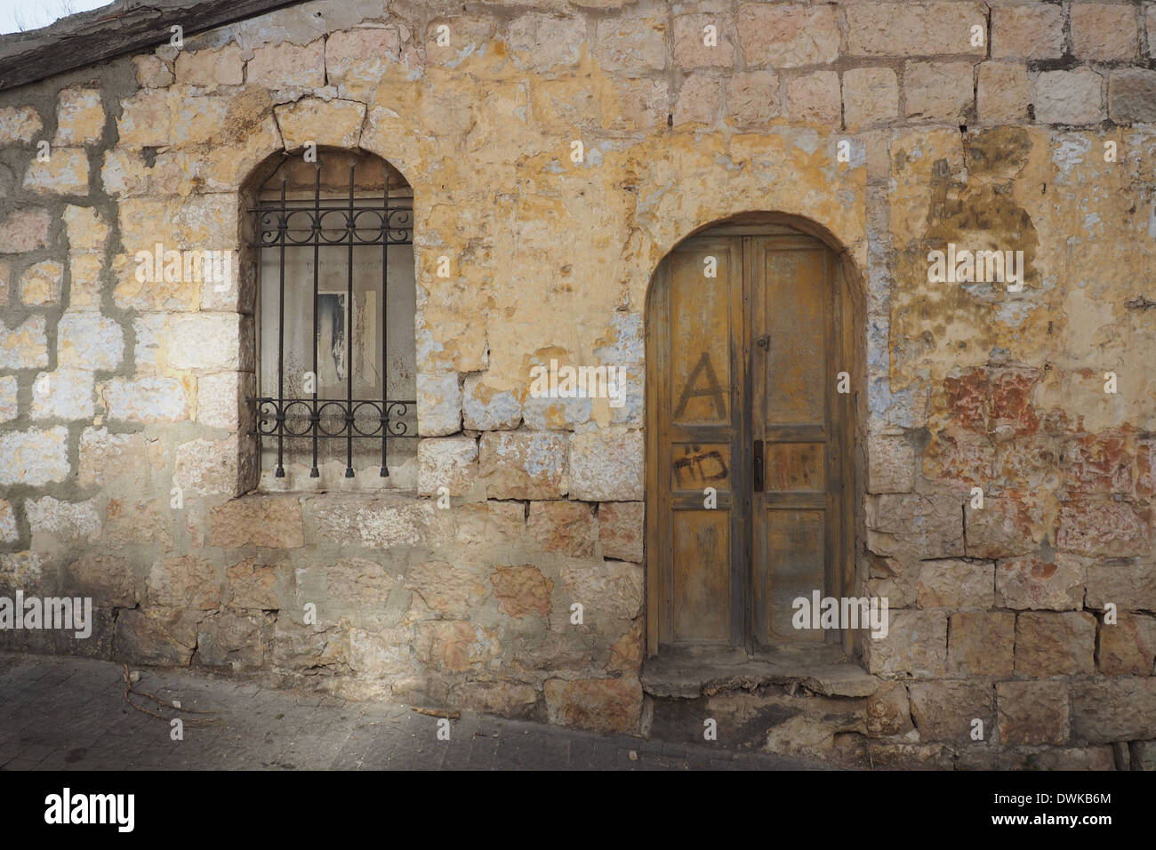 Jerusalem stone building with arched window and door near Mehane Yehuda ...