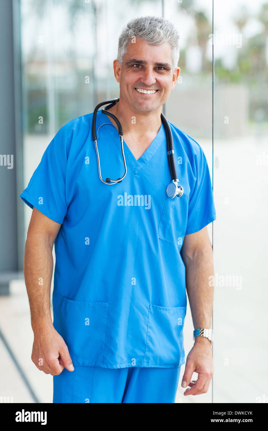Senior doctor standing in office hi-res stock photography and images ...