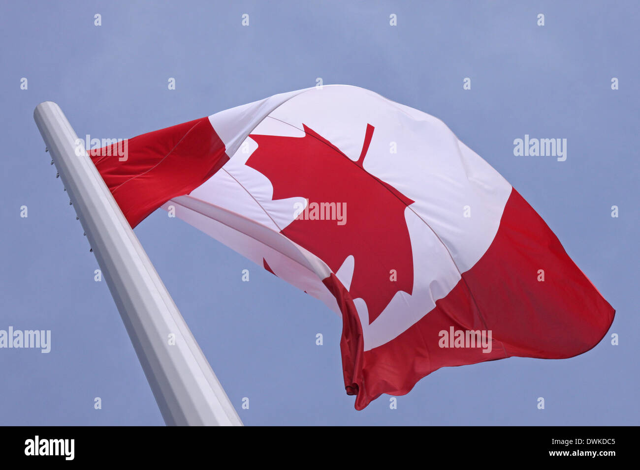 flag of Canada over blue sky Stock Photo - Alamy