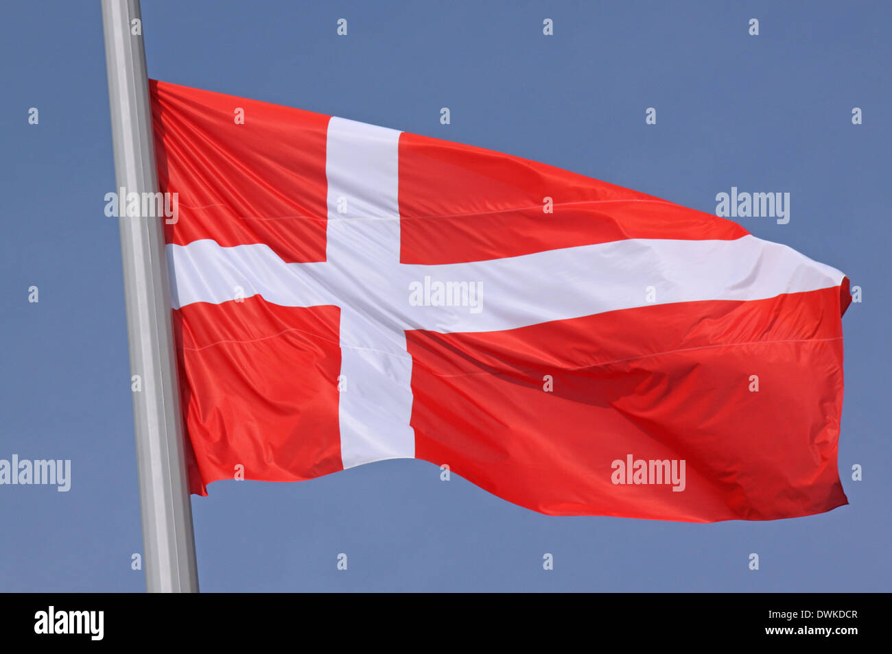 flag of Denmark over blue sky Stock Photo - Alamy