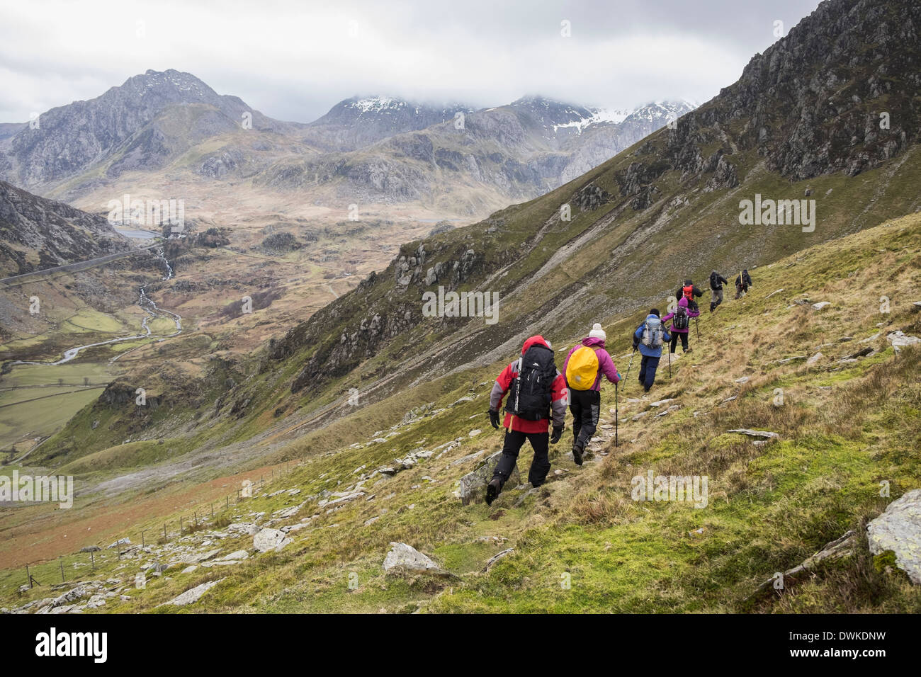 Group of Ramblers traversing around Foel Goch above Nant Ffrancon ...