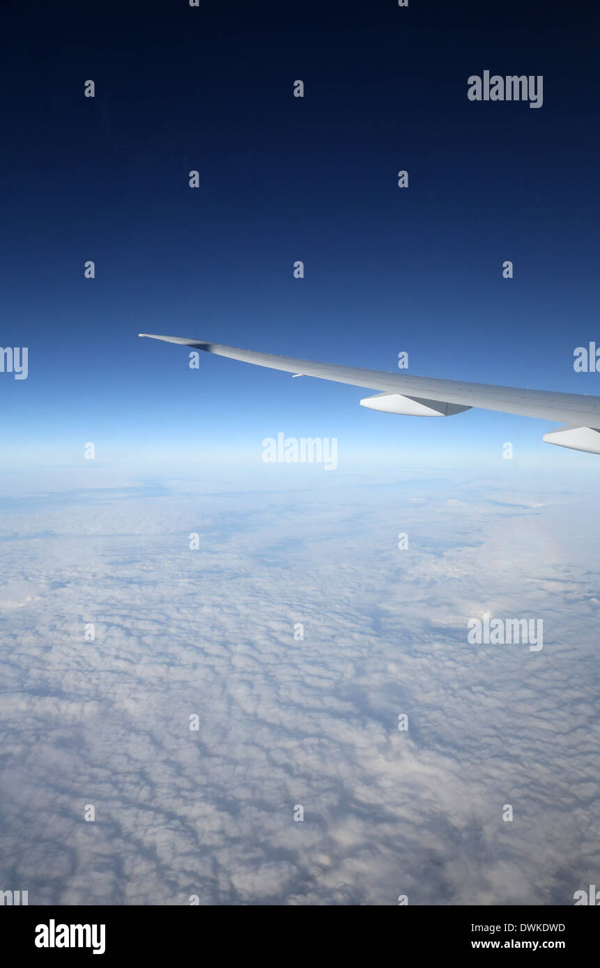 Wing of airplane from window Stock Photo - Alamy