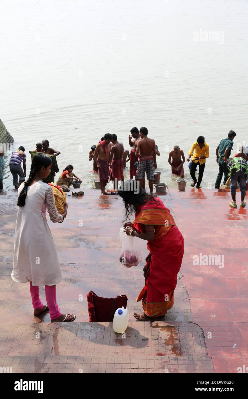 Morning ritual on the Hoogly(Ganges) river in the ghat near the ...