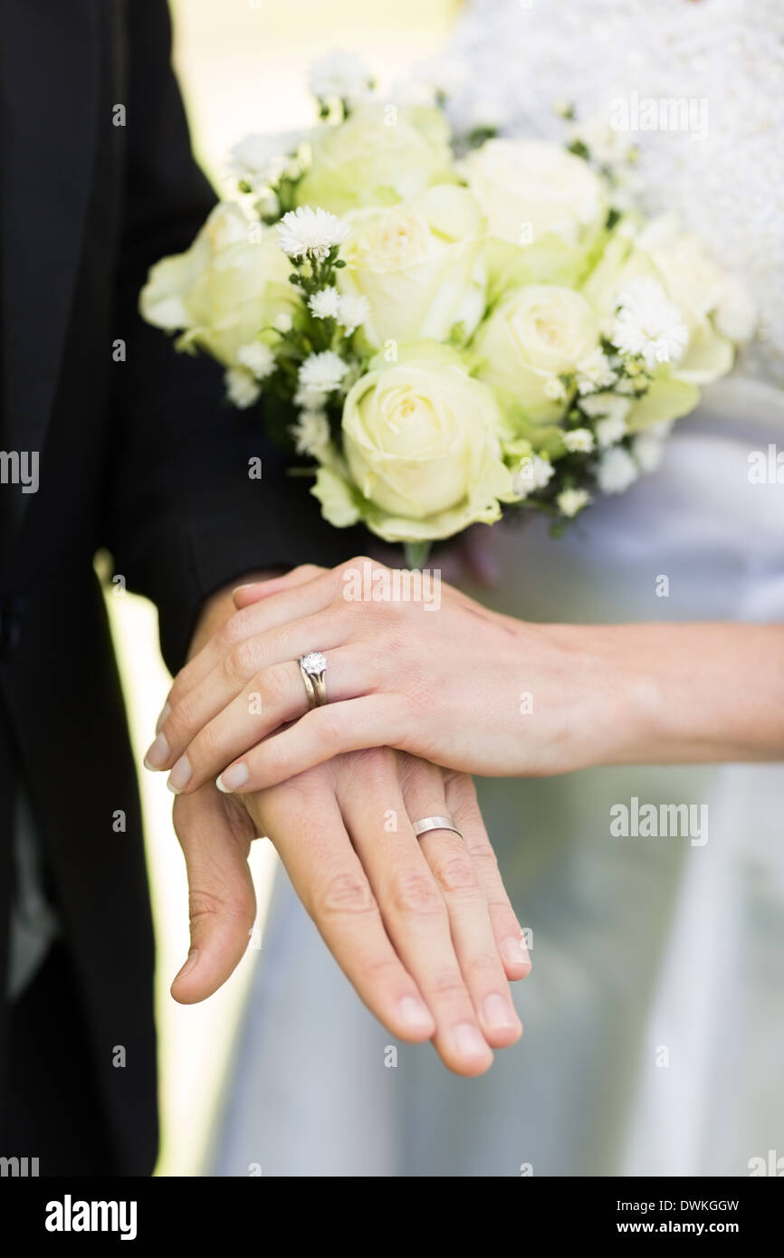 Groom showing wedding rings close hi-res stock photography and images ...