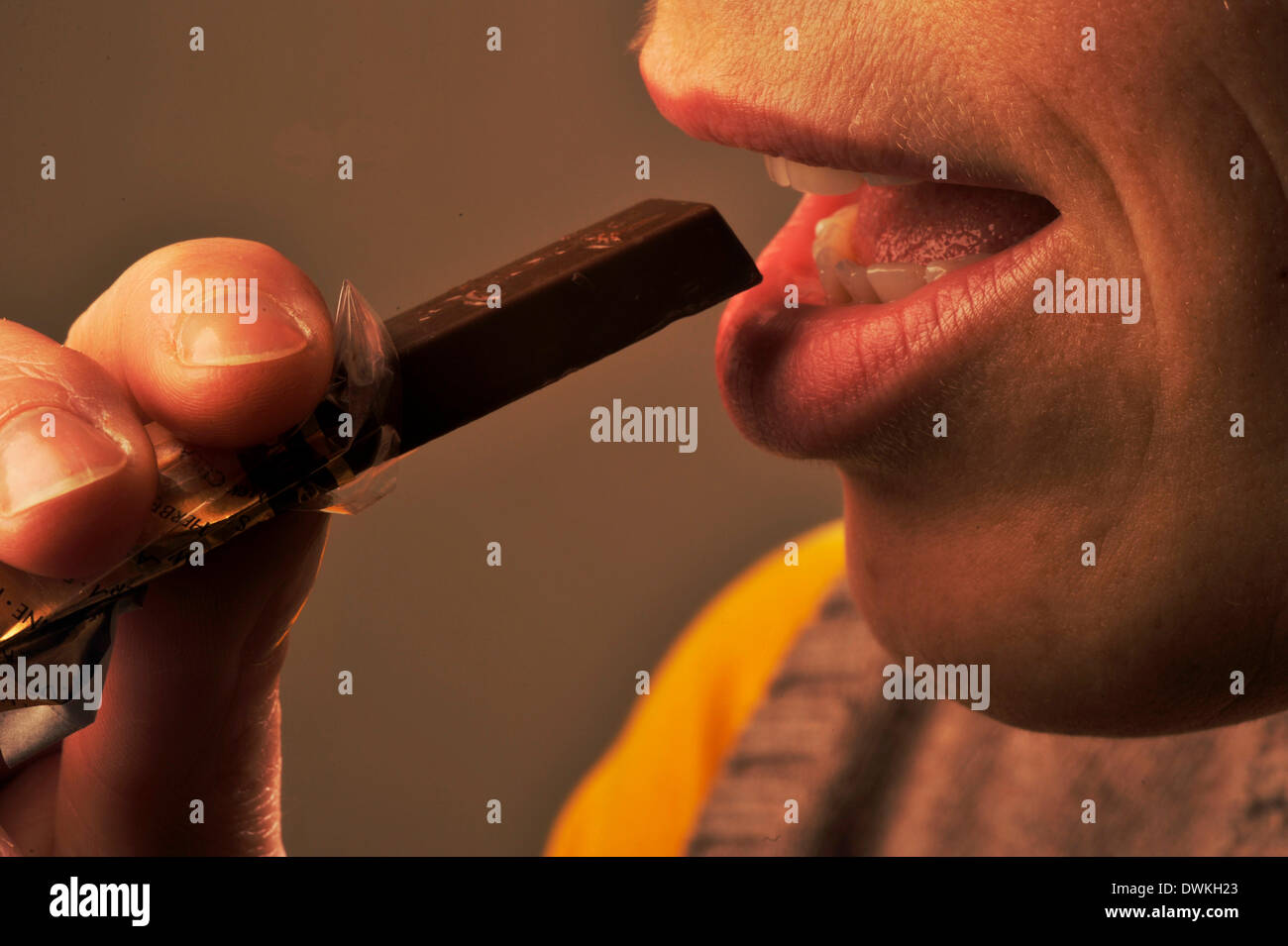 Symbolic picture about sugar in foods: Woman eating chocolate Stock ...