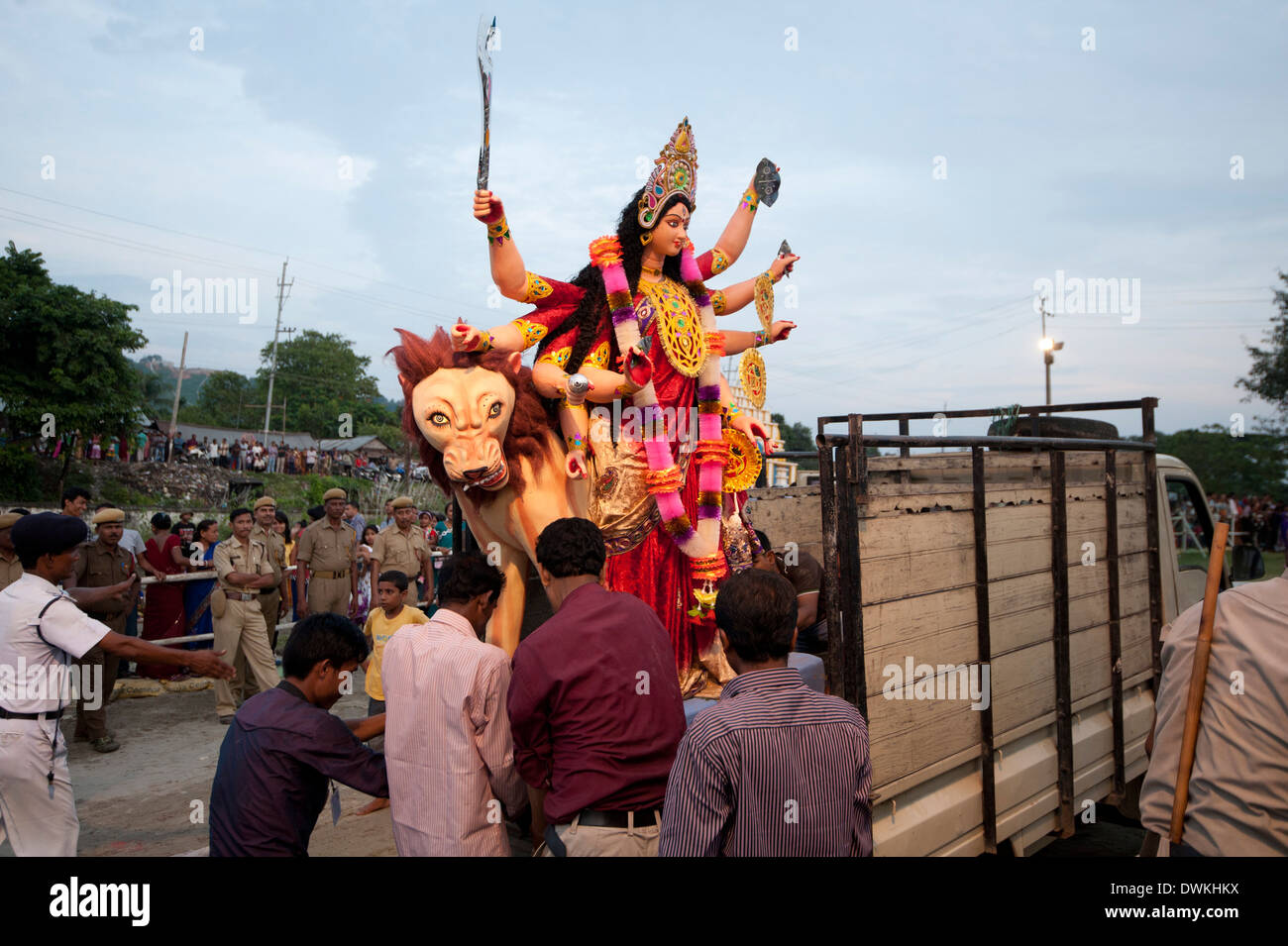Durga puja deity, made from river mud, being taken to the Brahmaputra ...