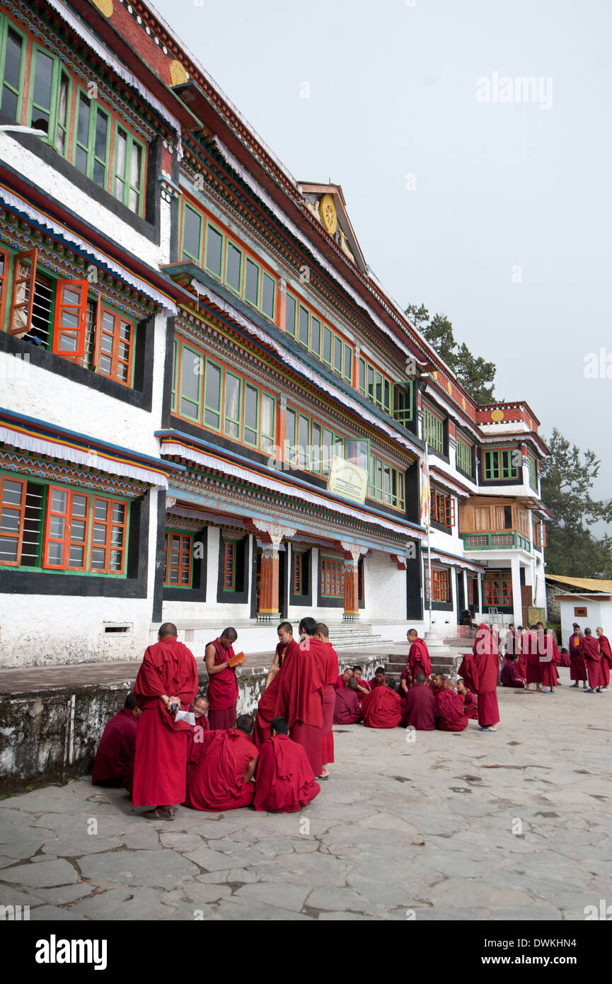 Buddhist monks gathering in groups in front of Tawang Buddhist ...