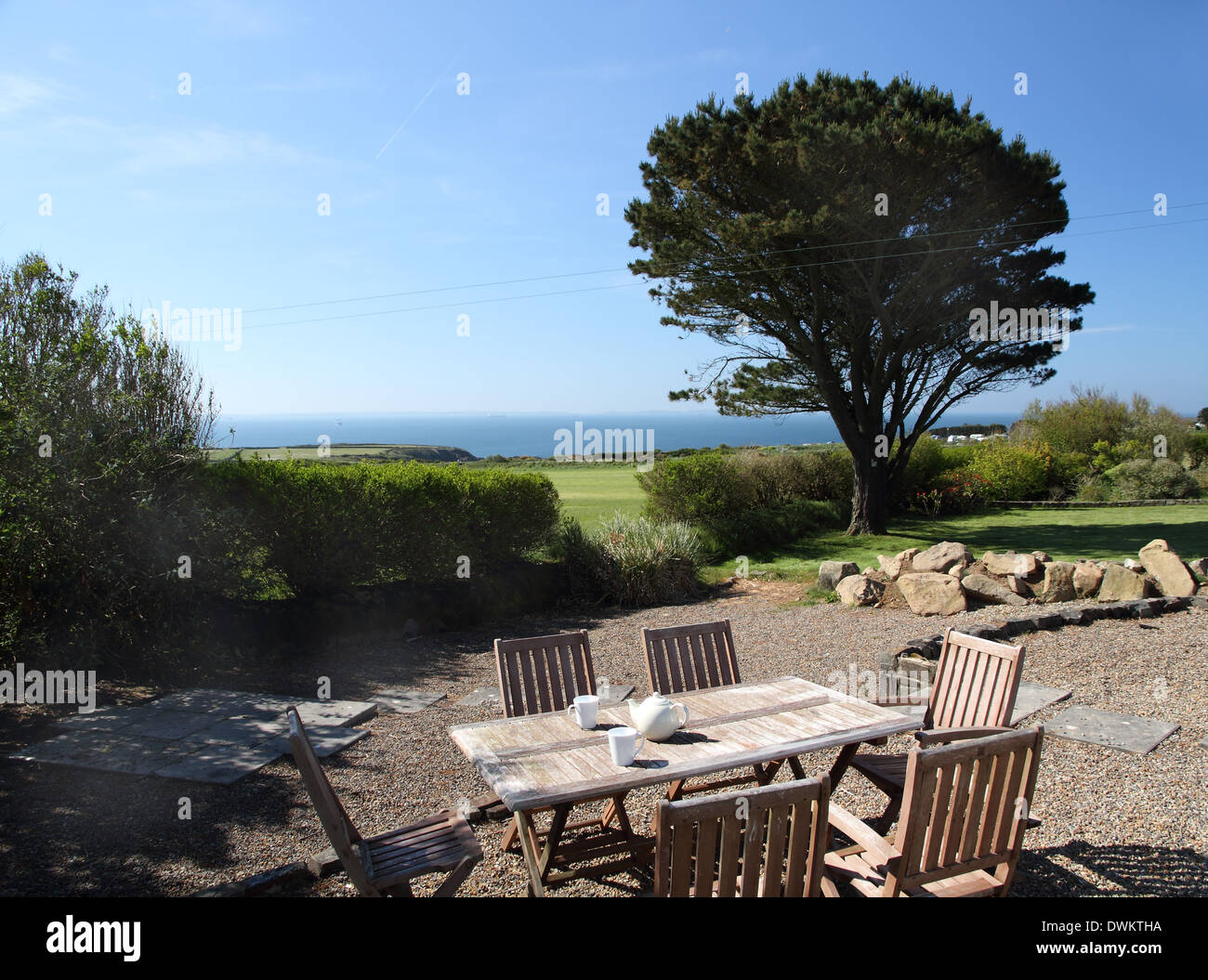 Sea view from outdoor dining table Stock Photo - Alamy