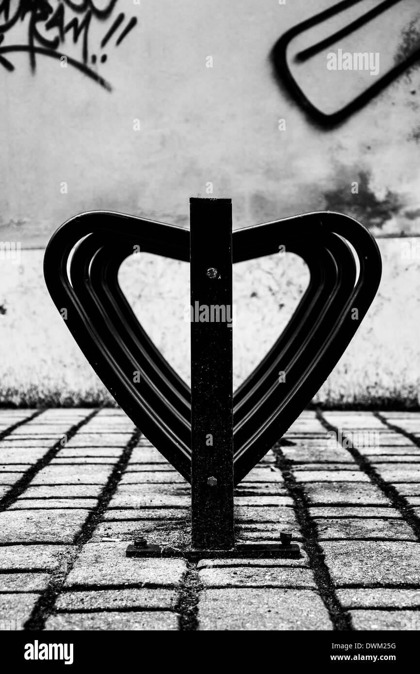 Heart-shaped bicycle rack Stock Photo - Alamy