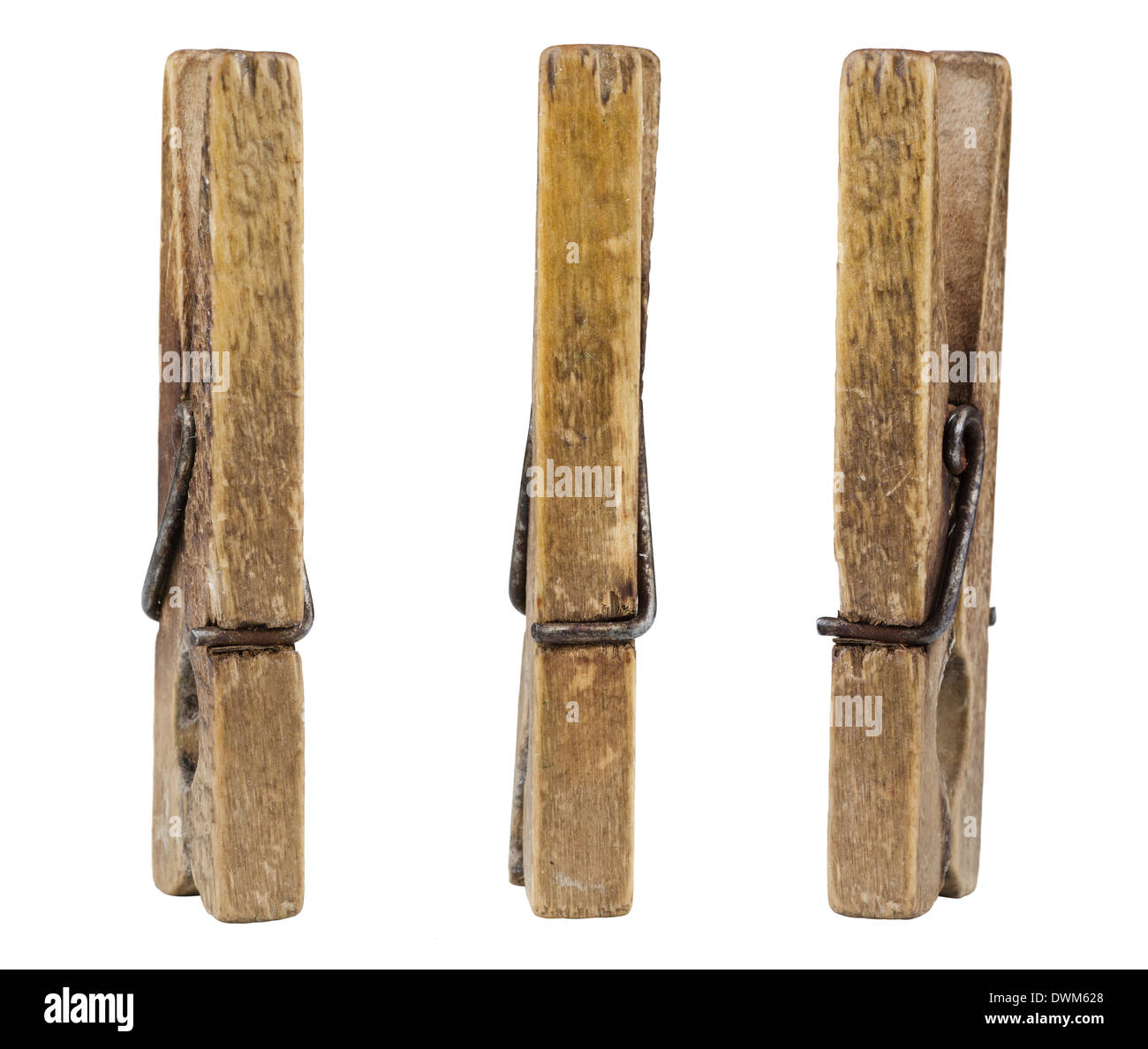 Three old wooden pegs isolated on white Stock Photo - Alamy