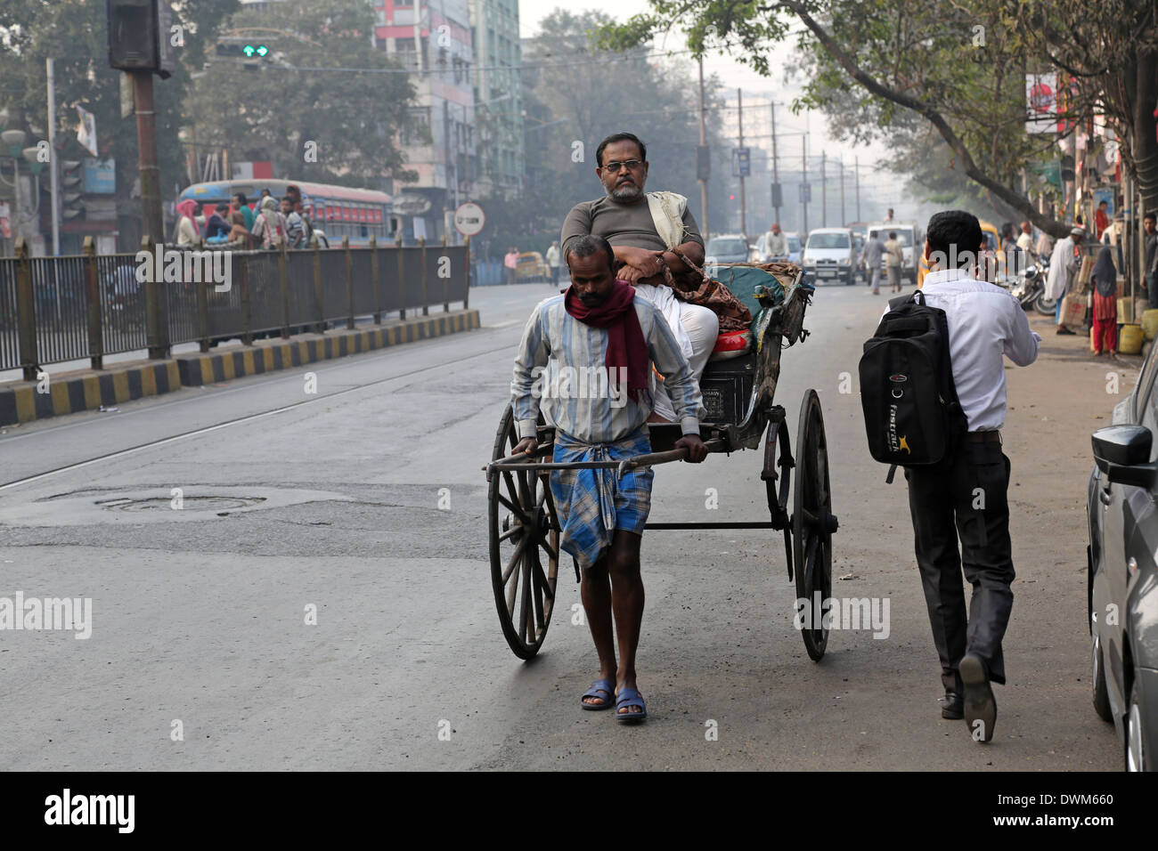 Rickshaw driver working on February 15 2014 in Kolkata, India Stock ...