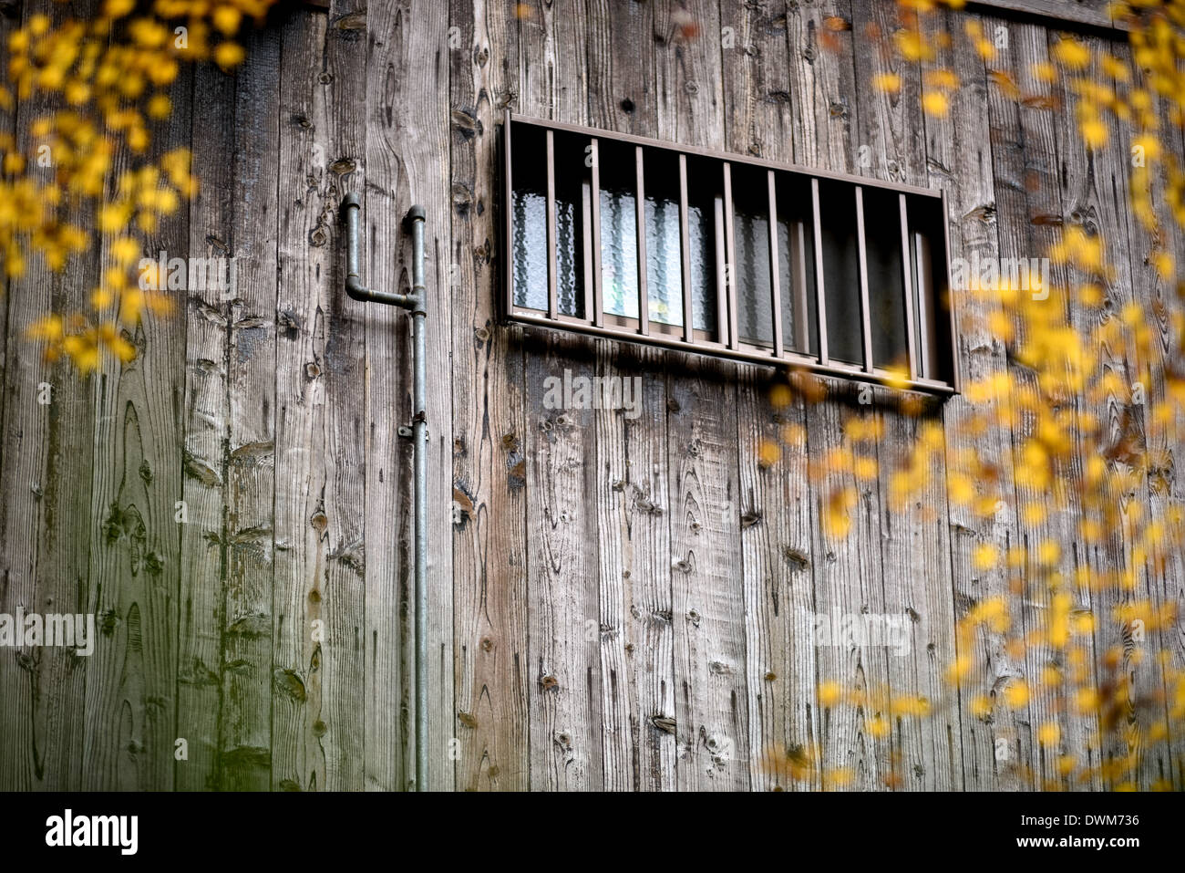 Window on wooden wall Stock Photo - Alamy