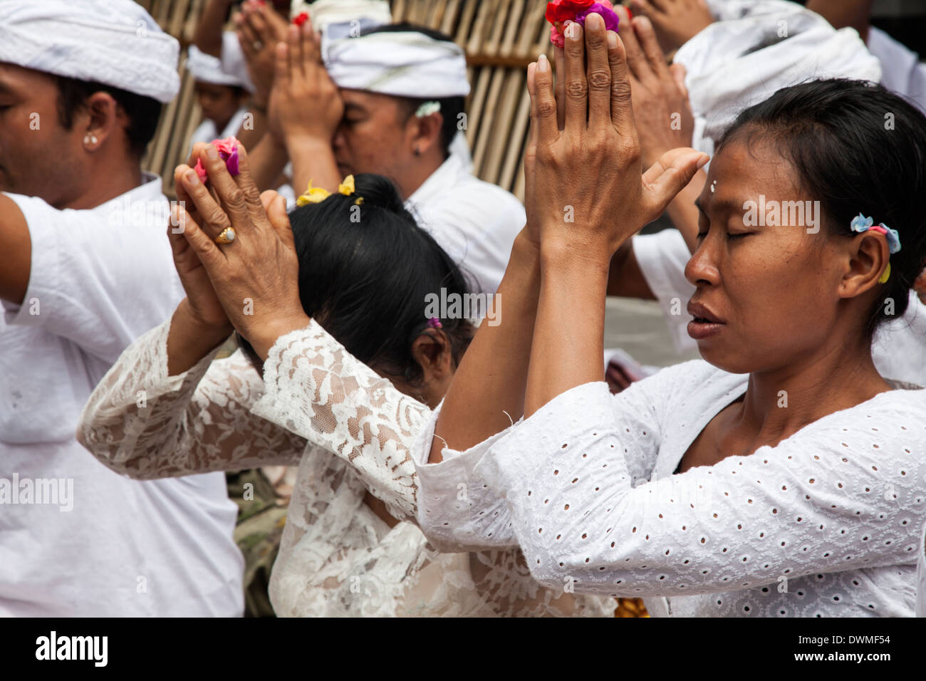 Hindus praying in Pura Besakih Temple in Bali, Indonesia Stock Photo ...
