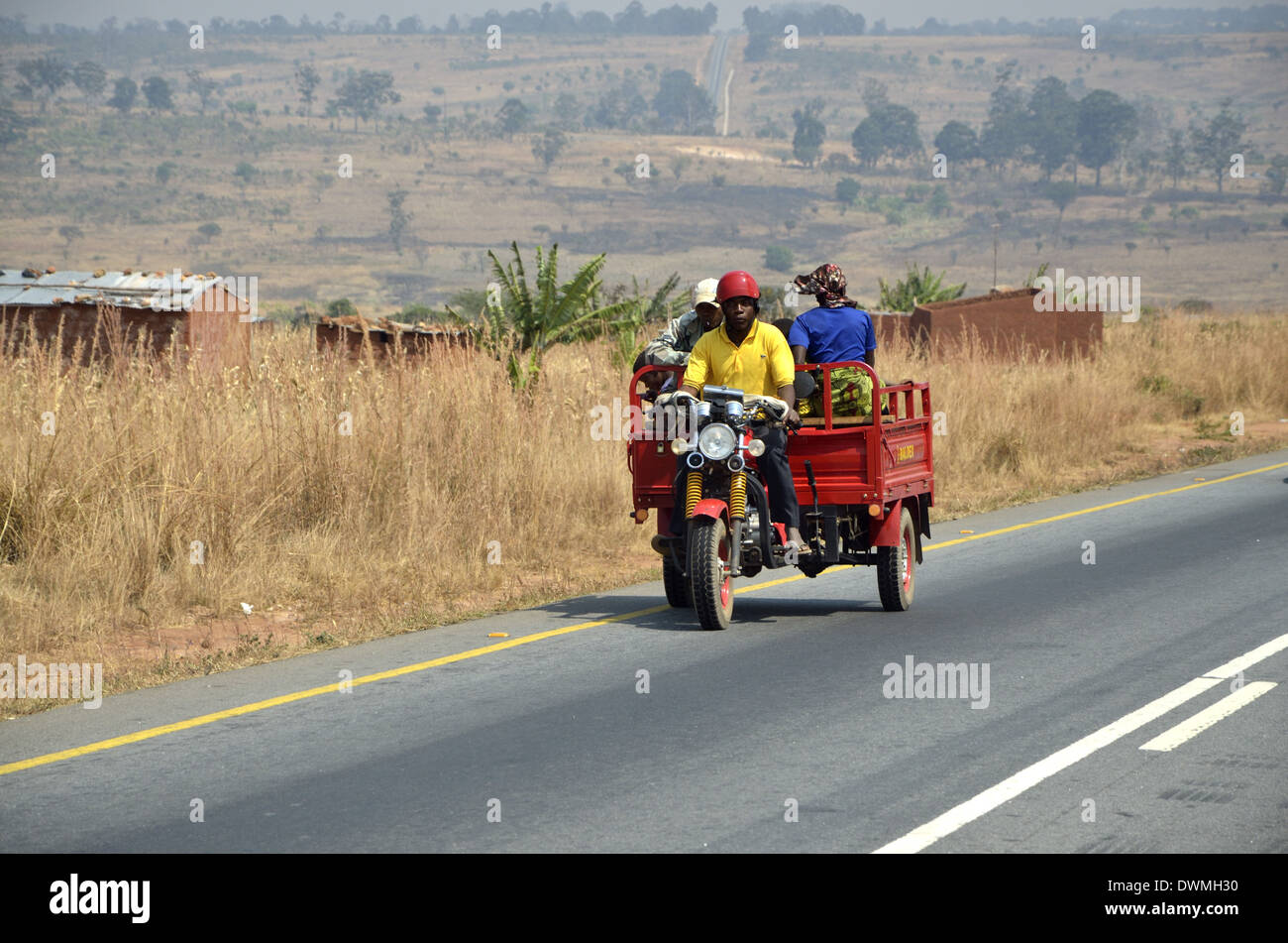 Locals on motorbike Angola Stock Photo - Alamy