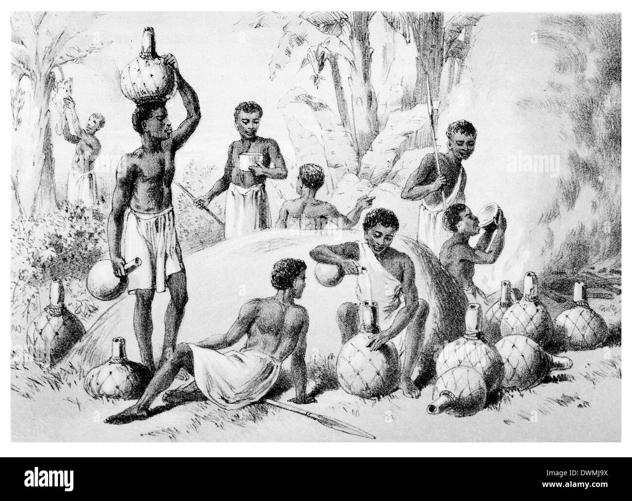 Natives making Pombe Millet beer Stock Photo - Alamy