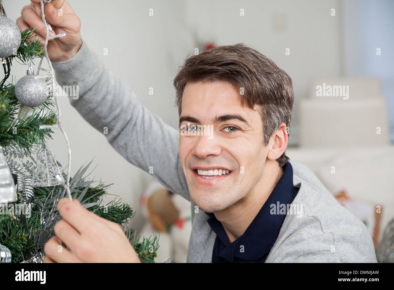 Man holding fairy lights hi-res stock photography and images - Alamy