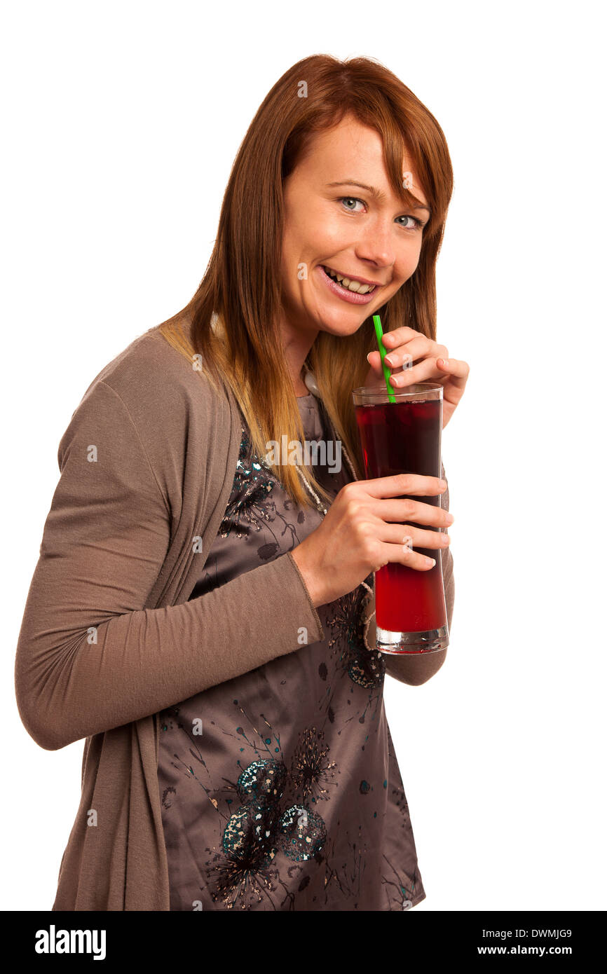 Beautiful young woman in red dress with a glass of ice tea isolated ...