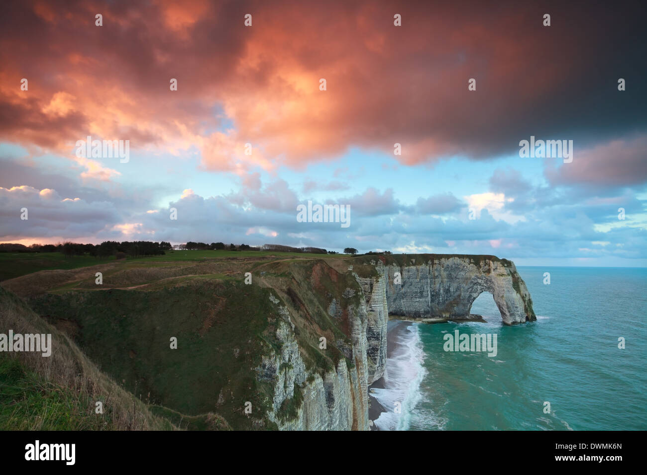 dramatic sunrise over cliff in ocean, Etretat, Normandy, France Stock ...