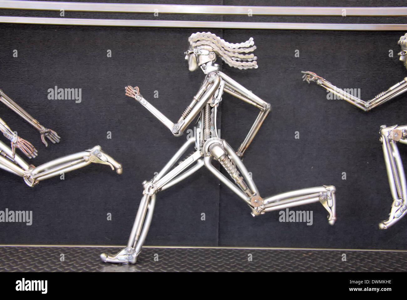 Metal sculpture running man hi-res stock photography and images - Alamy