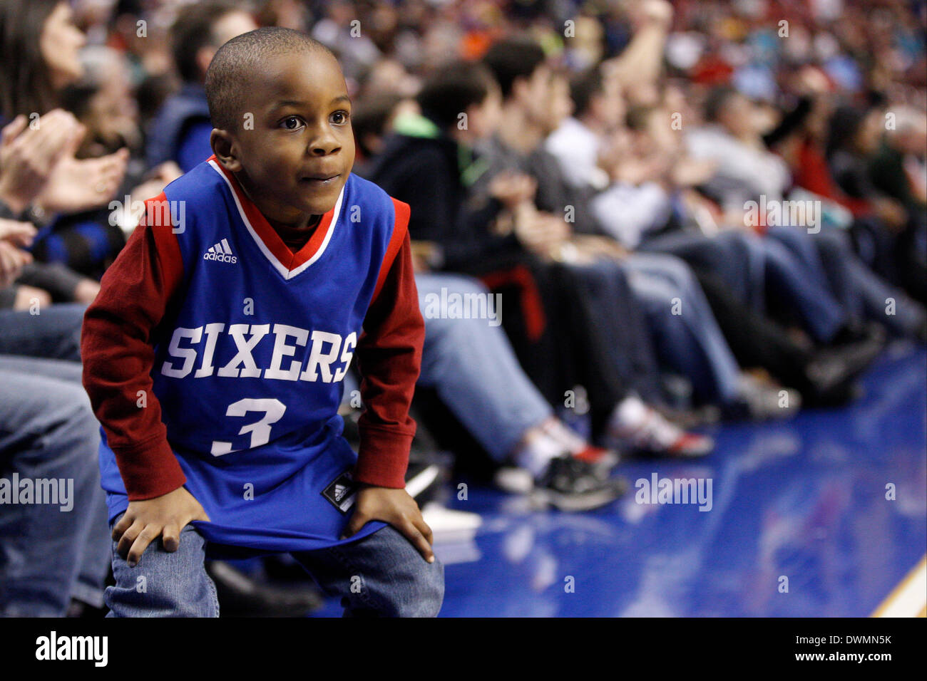 March 8, 2014: A young Philadelphia 76ers fan looks on during the NBA ...