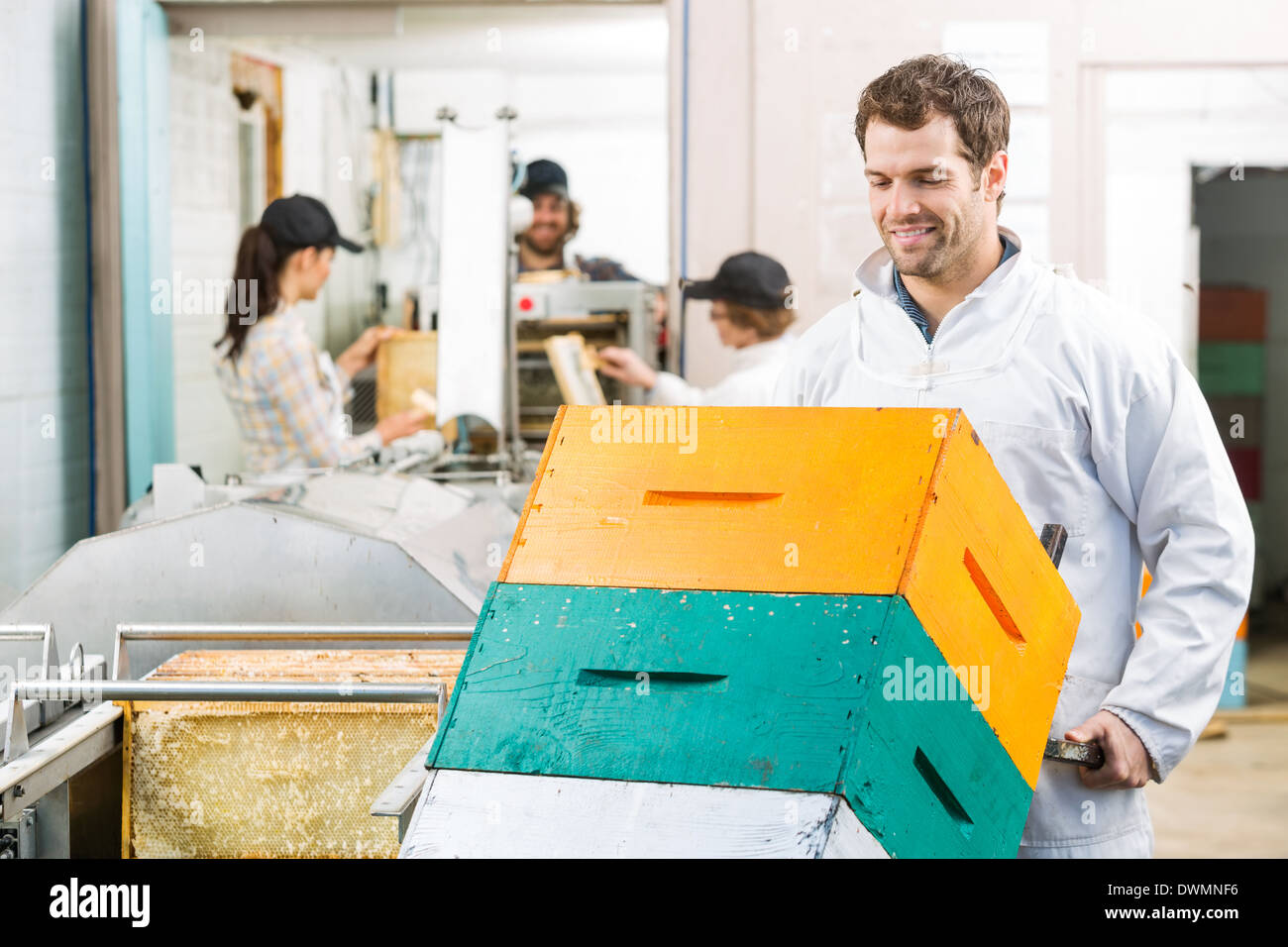 Man holding container wax hi-res stock photography and images - Alamy