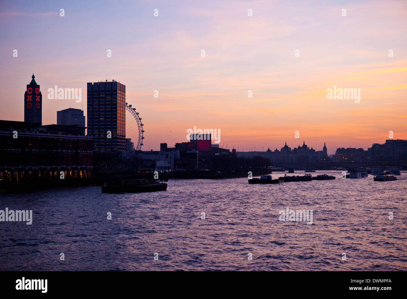 A beautiful sunset in London taking in the River Thames, London Eye and ...