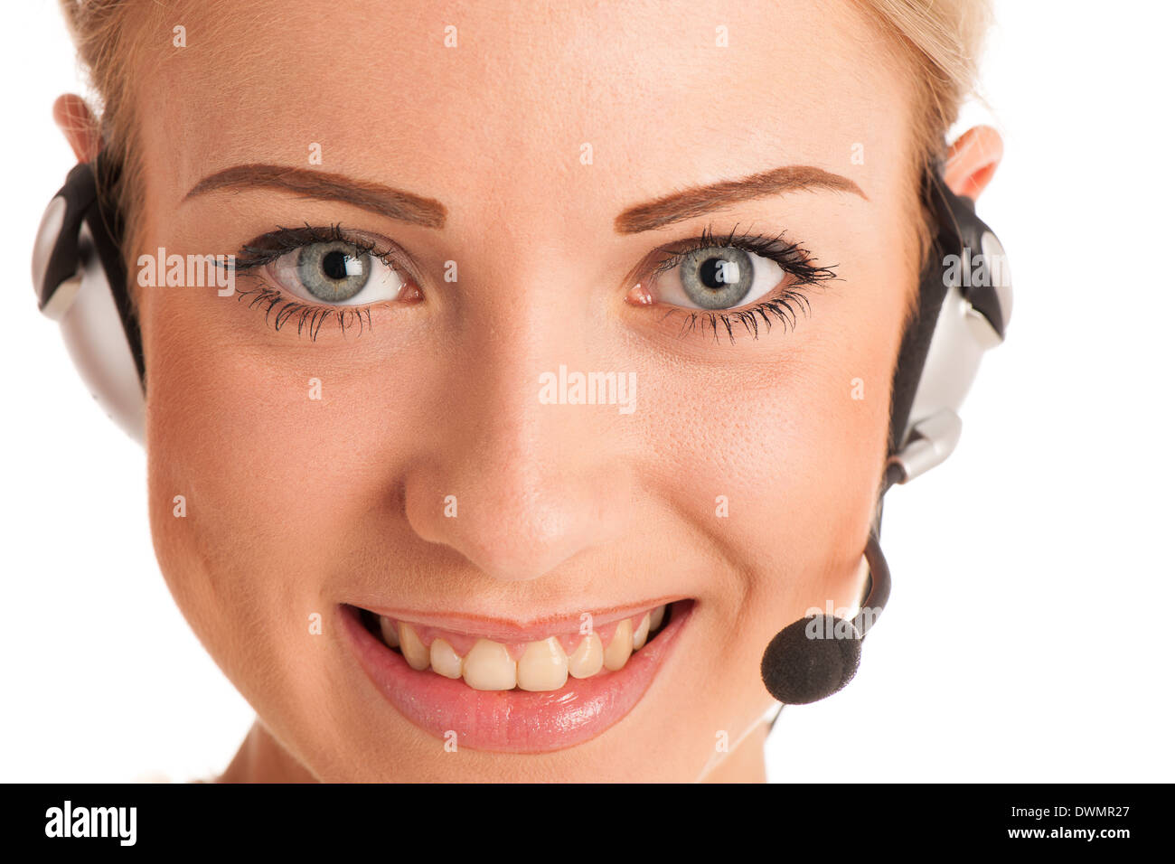 Beautiful young business woman with headset isolated over white background Stock Photo - Alamy