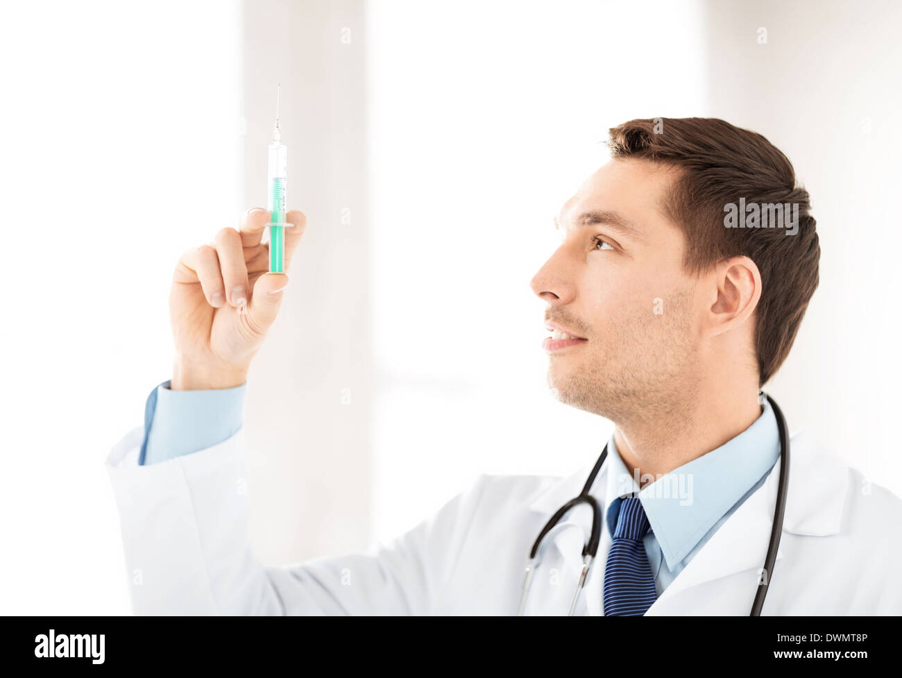male doctor holding syringe with injection Stock Photo - Alamy