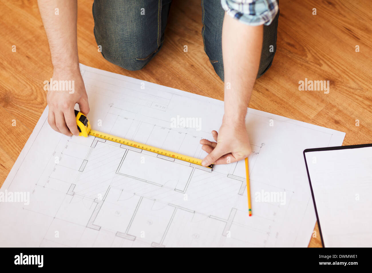 Blueprint with pen and tape measure hi-res stock photography and images ...