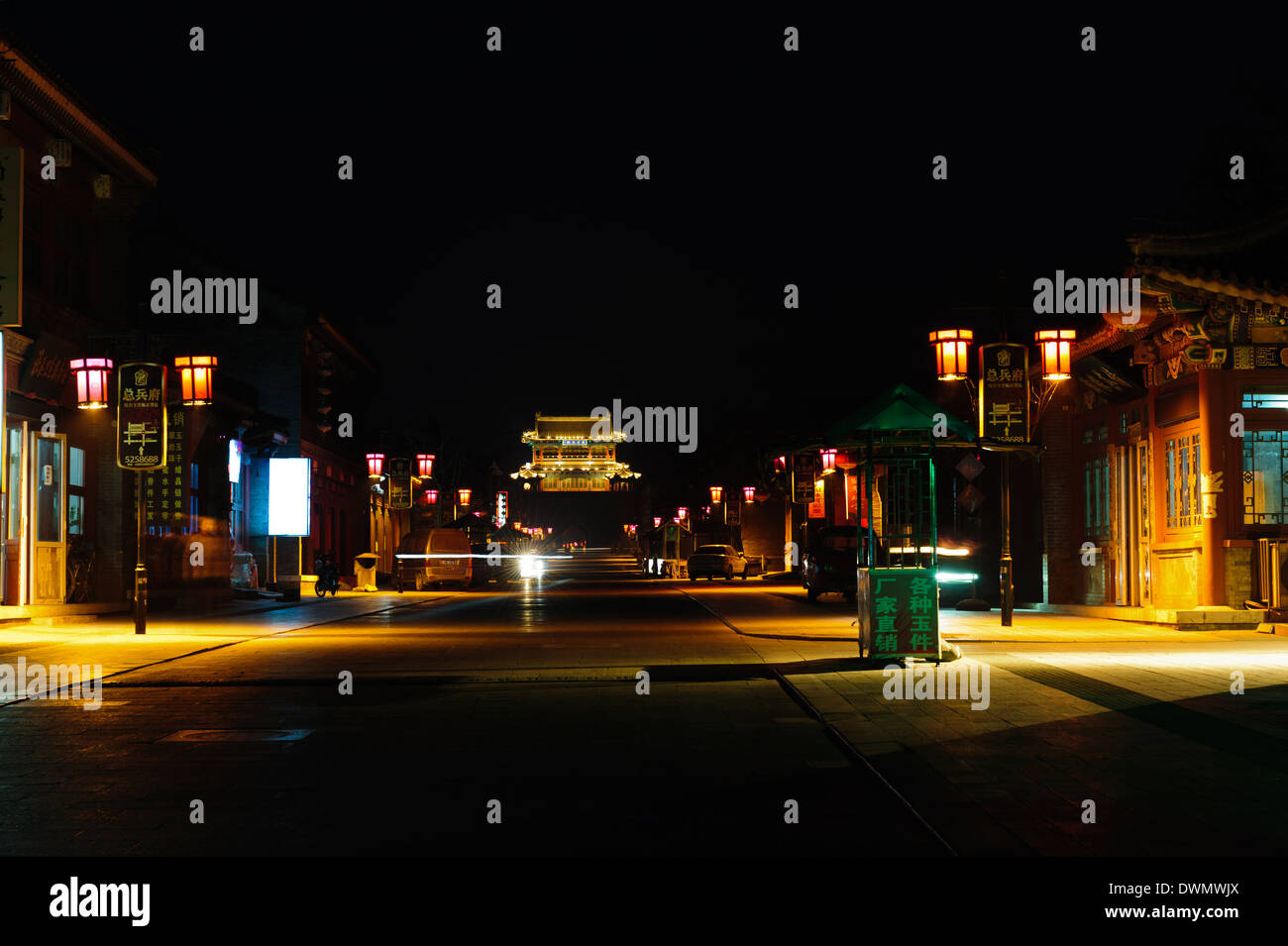 Reconstructed "old" town of Shanhaiguan at night. Illuminated streets ...