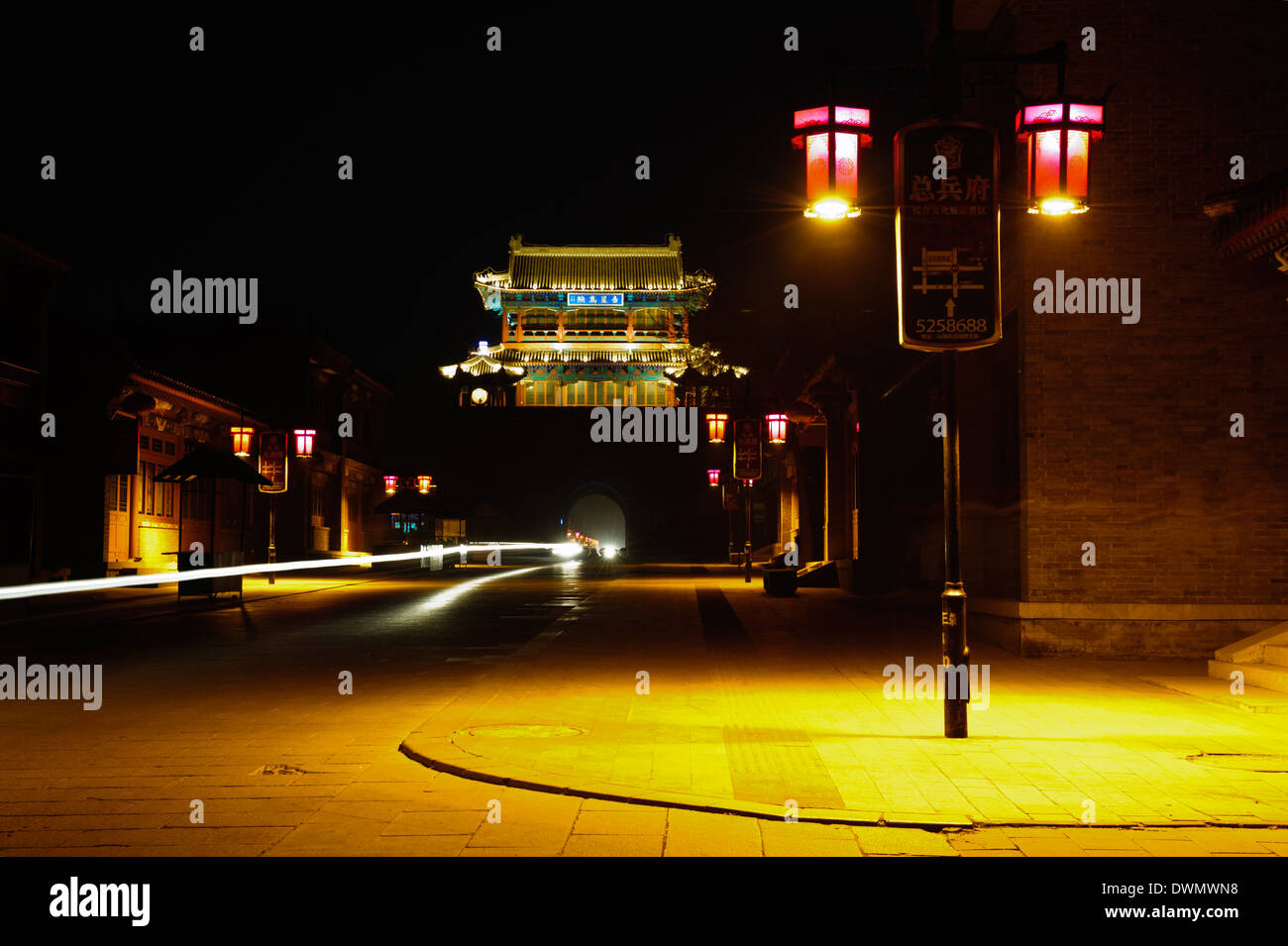 Reconstructed "old" town of Shanhaiguan at night. Illuminated streets ...
