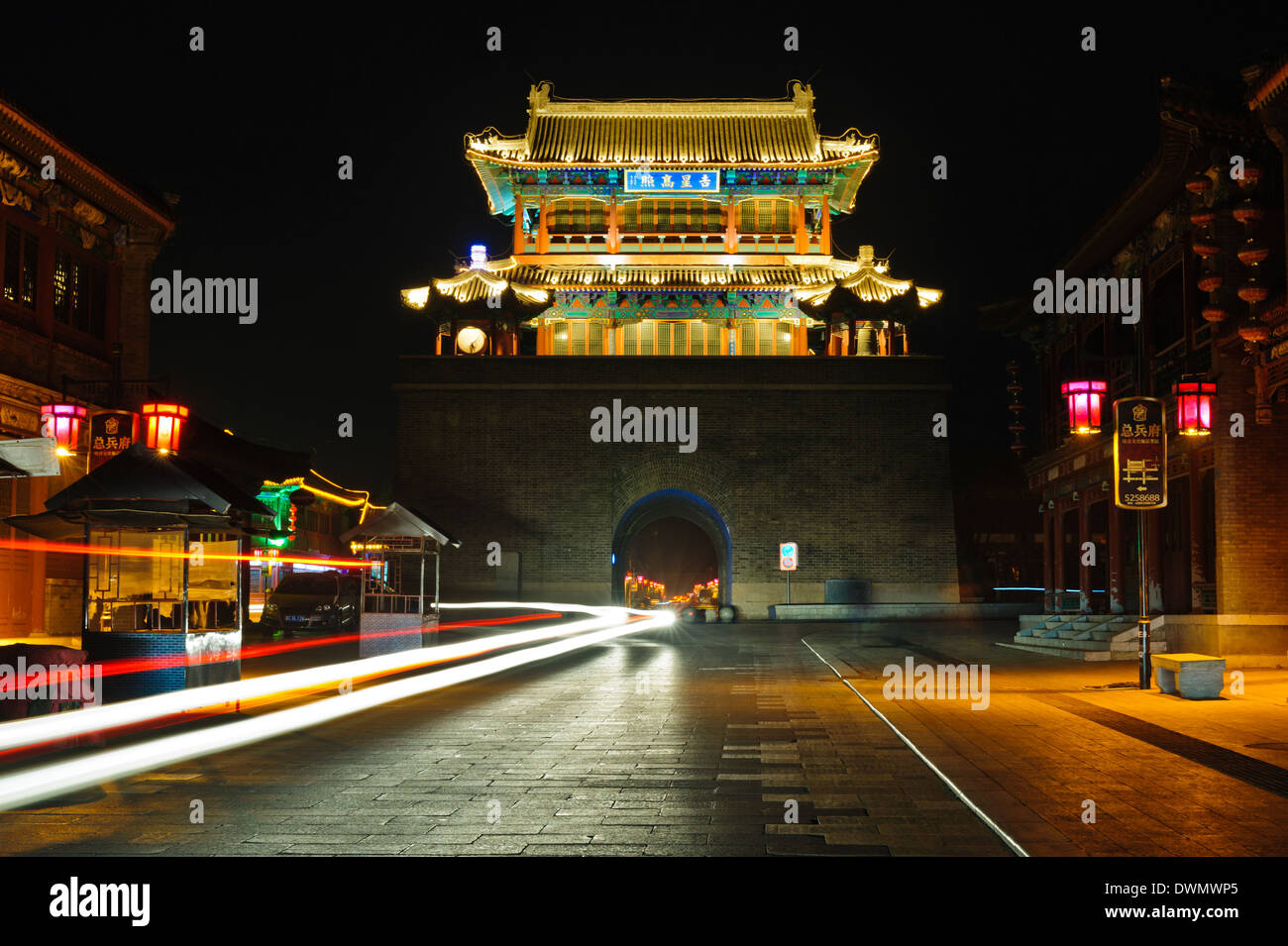 Reconstructed "old" town of Shanhaiguan at night. Illuminated streets ...