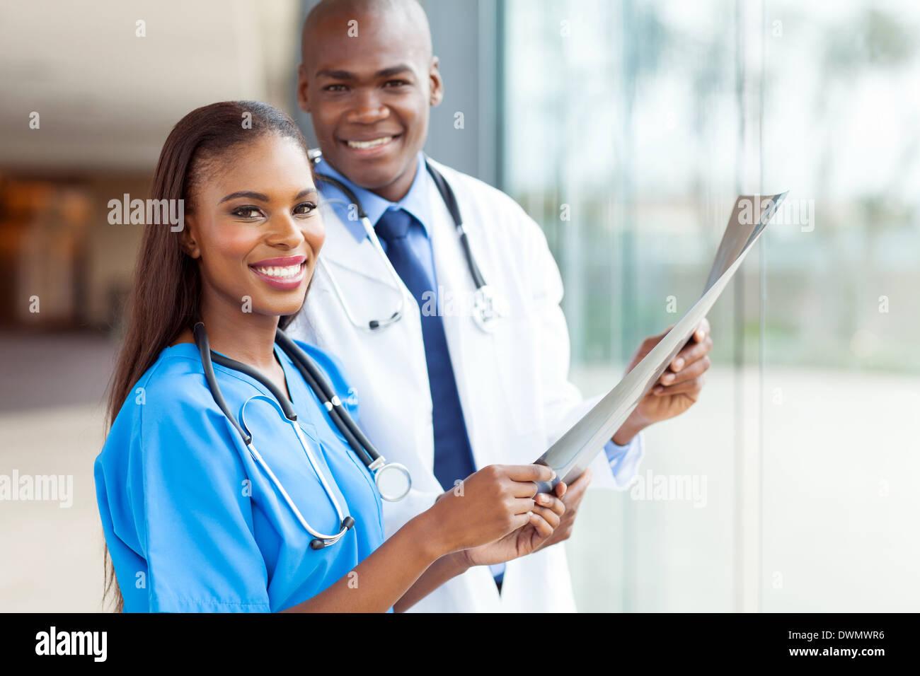 smiling young African medical doctors holding patient's x-ray Stock ...