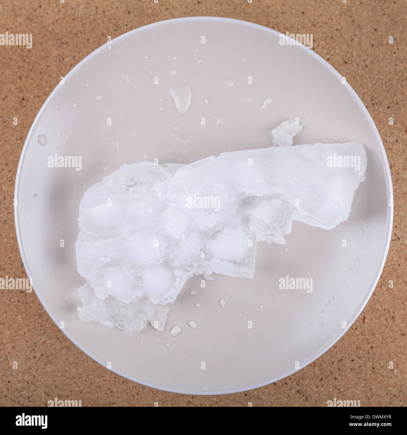 Frozen ice water on plate Stock Photo - Alamy