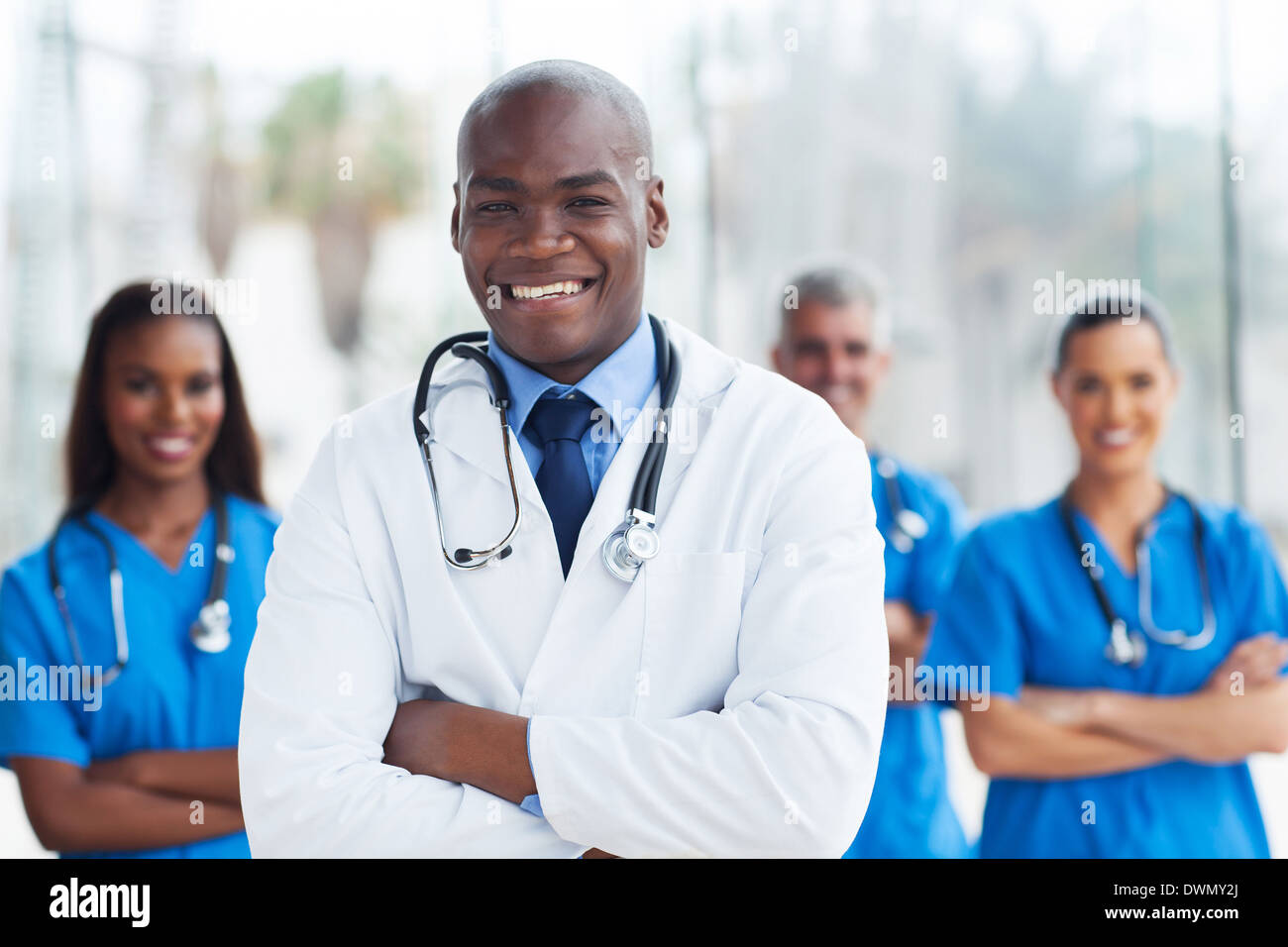 handsome African American medical doctor with colleagues in background ...