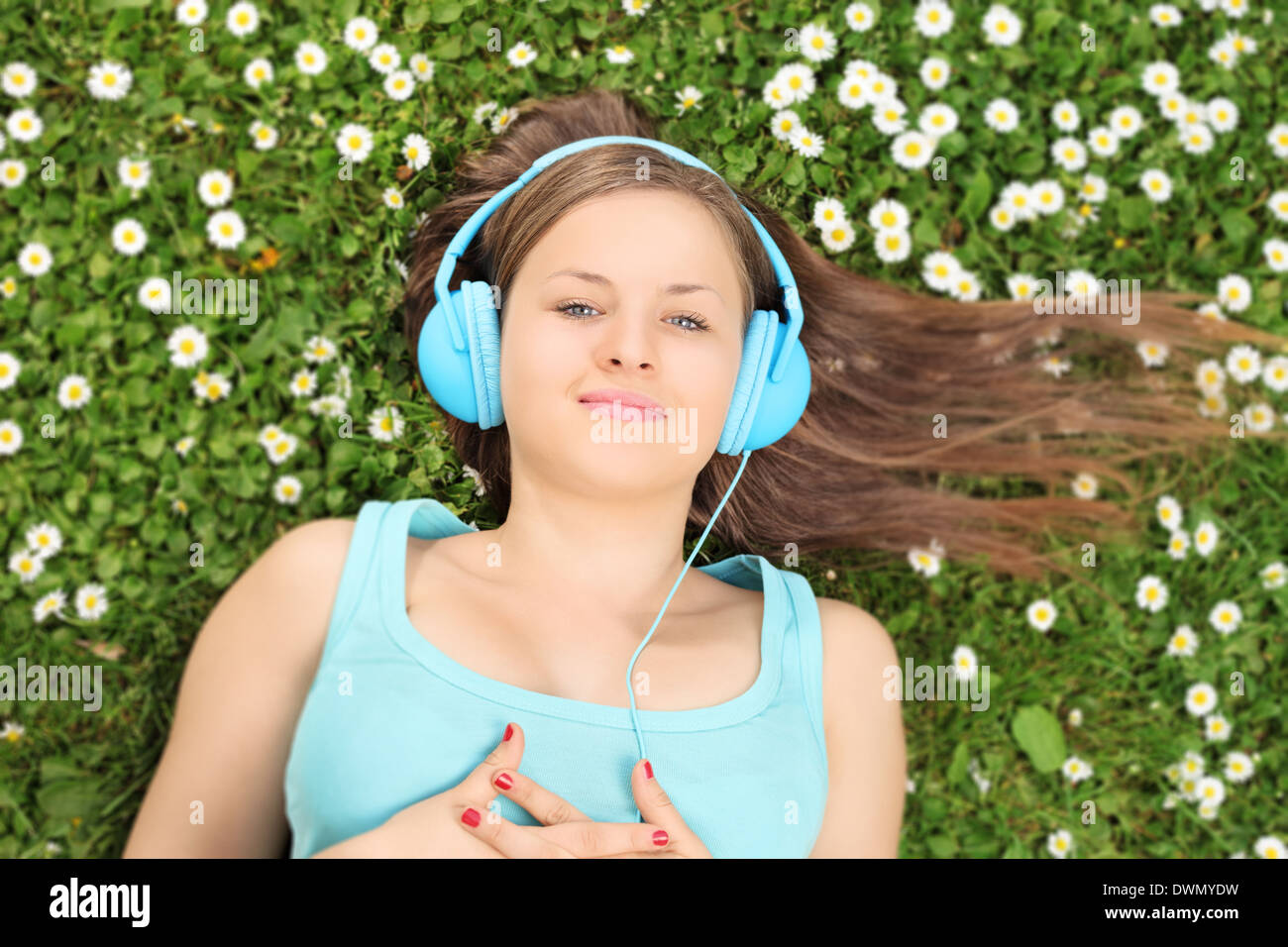 Woman laying flowers hi-res stock photography and images - Alamy