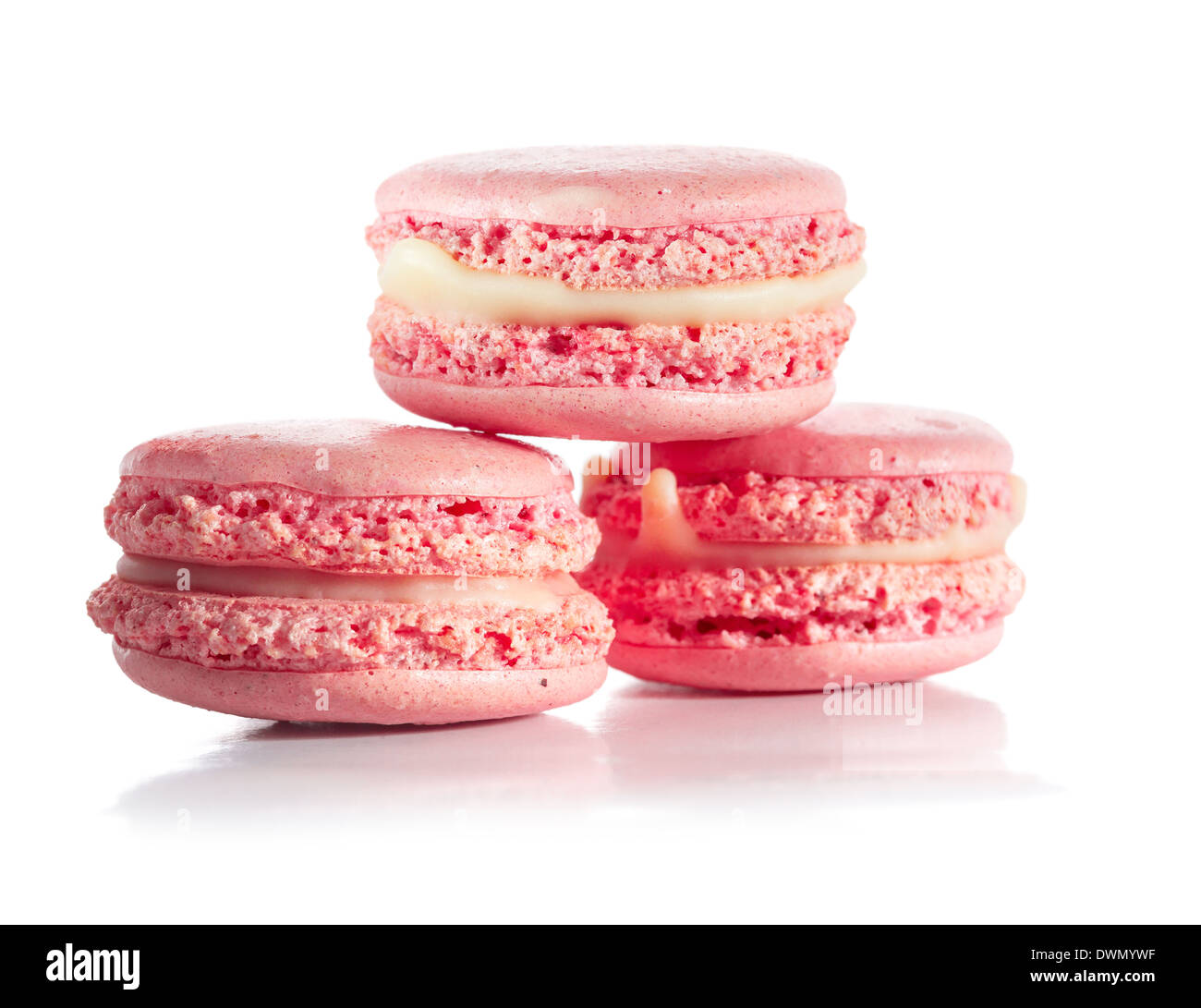 Pink French macarons isolated on white background Stock Photo - Alamy