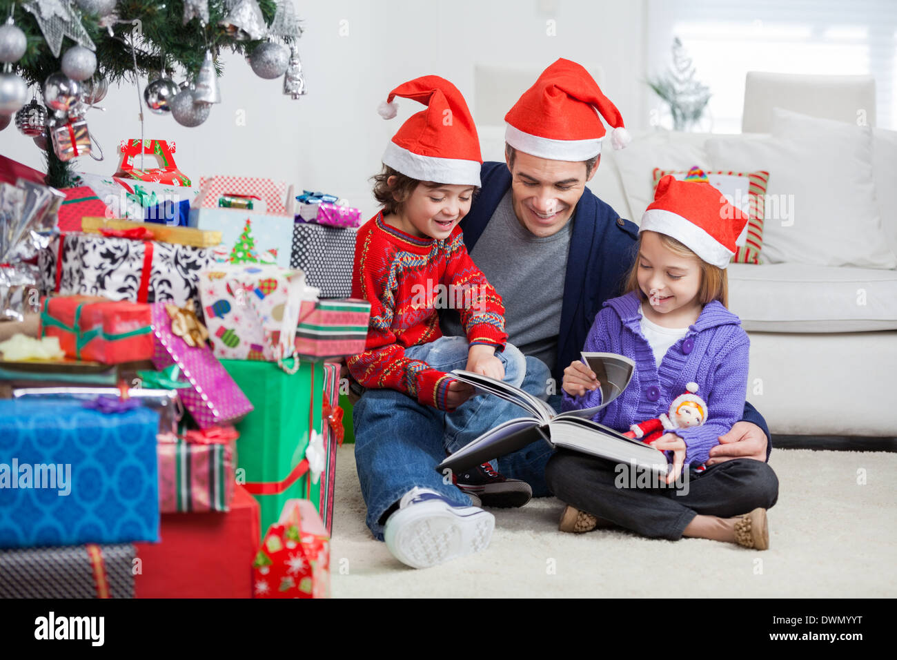 Father christmas reading hi-res stock photography and images - Alamy