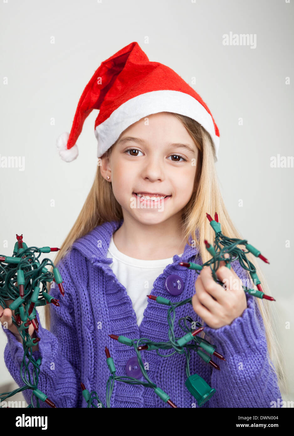 Female in santa hat hi-res stock photography and images - Alamy