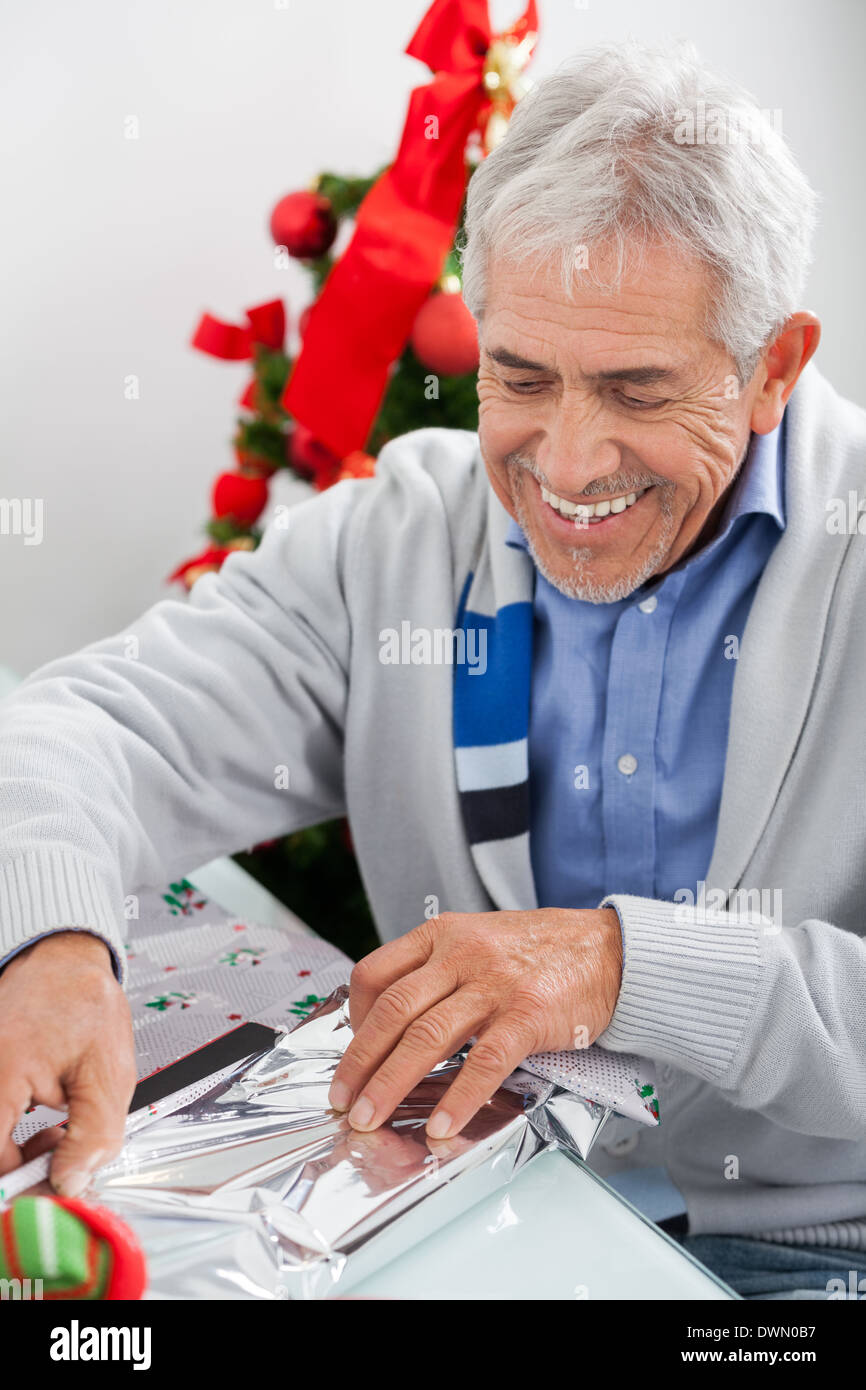 Person wrapping present hi-res stock photography and images - Alamy