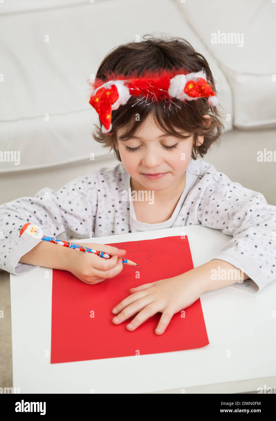 Child making christmas card hi-res stock photography and images - Alamy