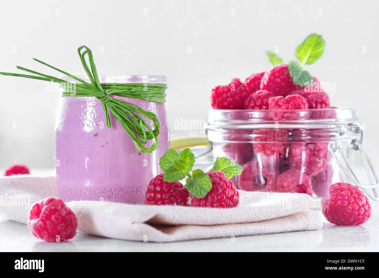 Raspberry yogurt with ripe raspberries Stock Photo - Alamy